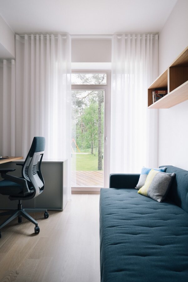 Minimalist Home With Blue And Yellow Accents