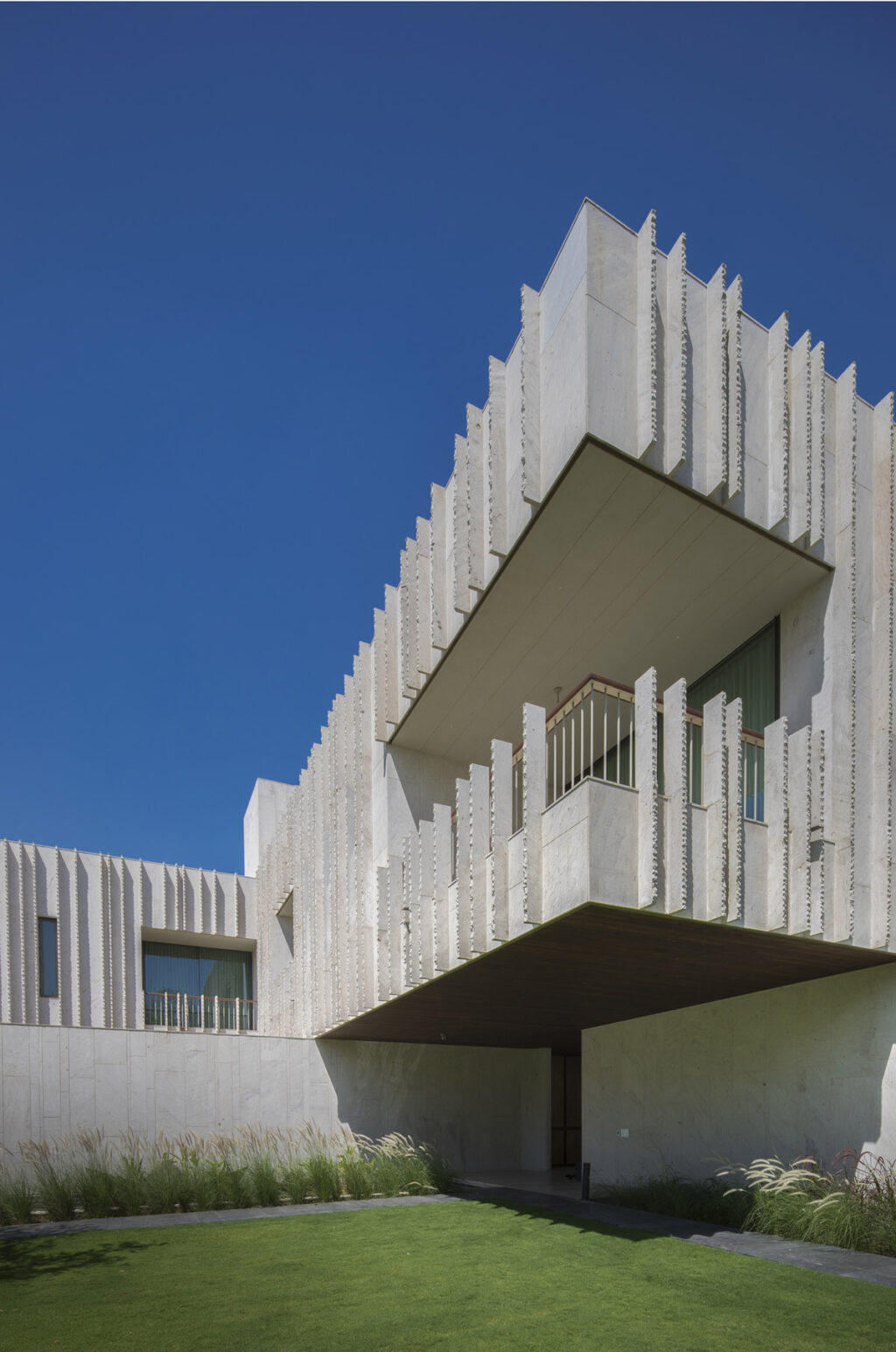 Cross Shaped Modern Home In Peaceful Landscaped Gardens