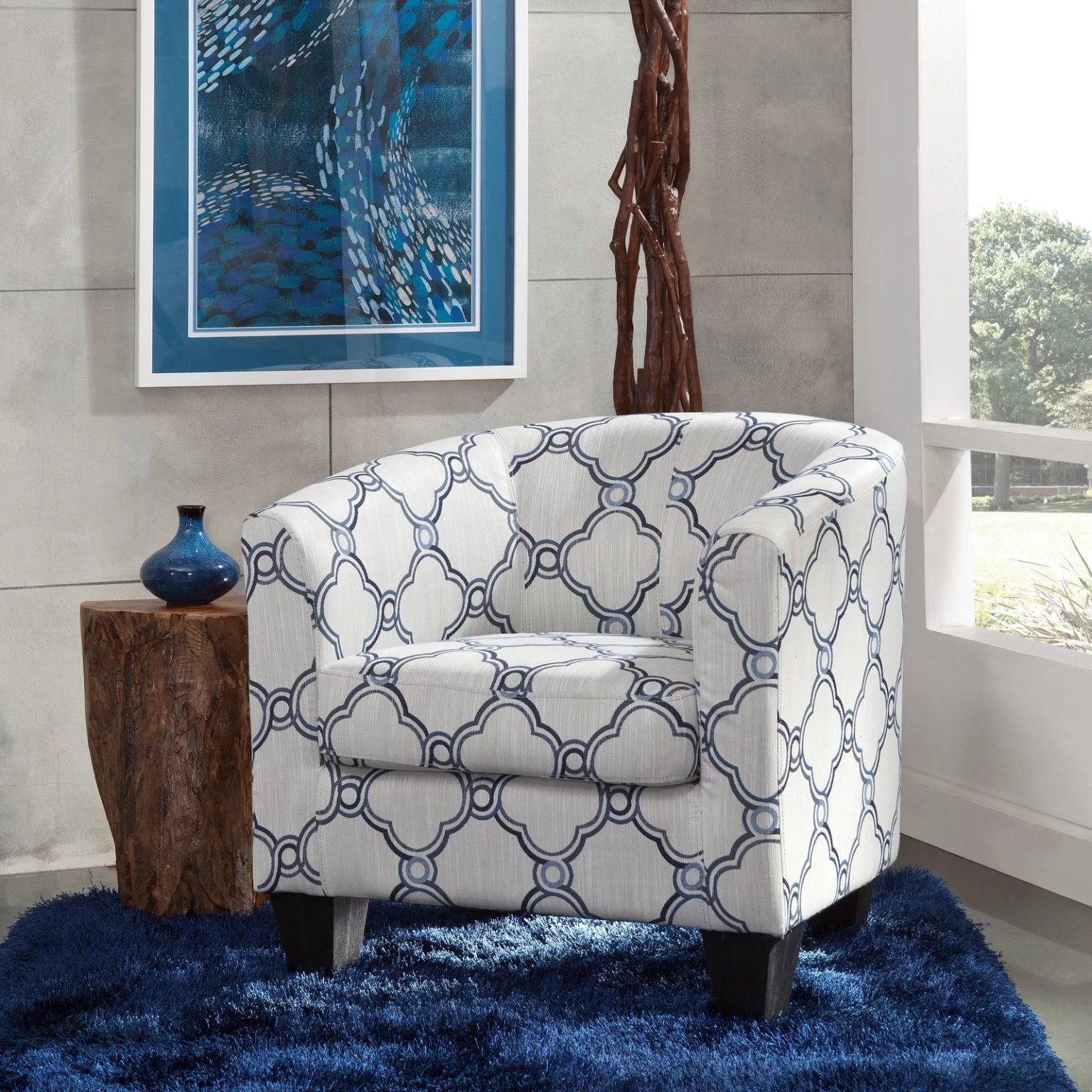 navy blue and white accent chair with trefoil patterned upholstery ...
