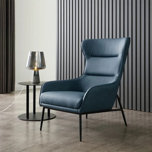 designer blue leather accent chair with tall wingback design and ...